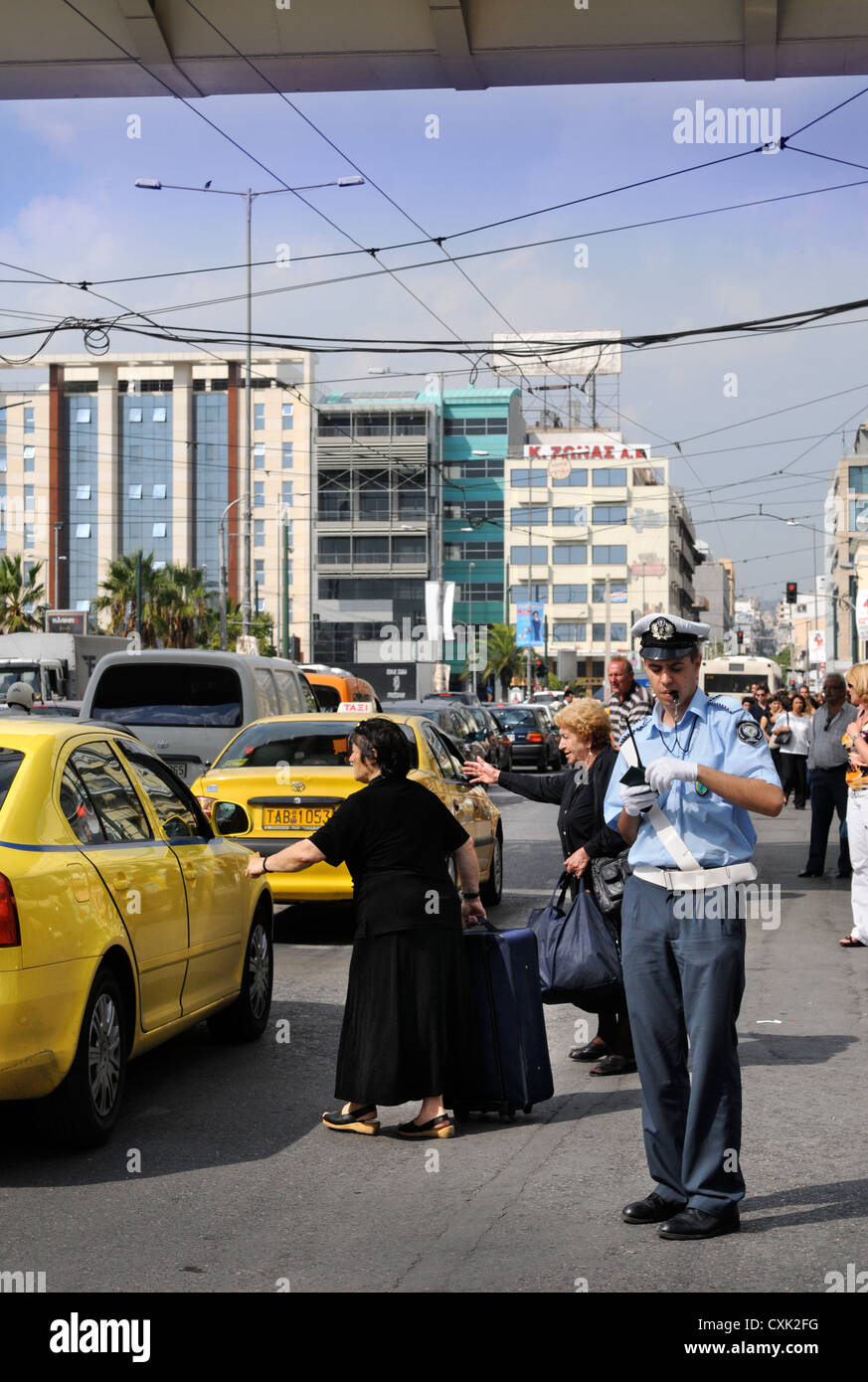 A Greek traffic policeman in Athens near the port of Piraeus Stock ...