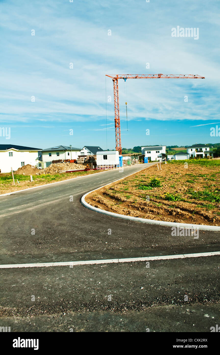 construction area with crane an d new houses Stock Photo - Alamy