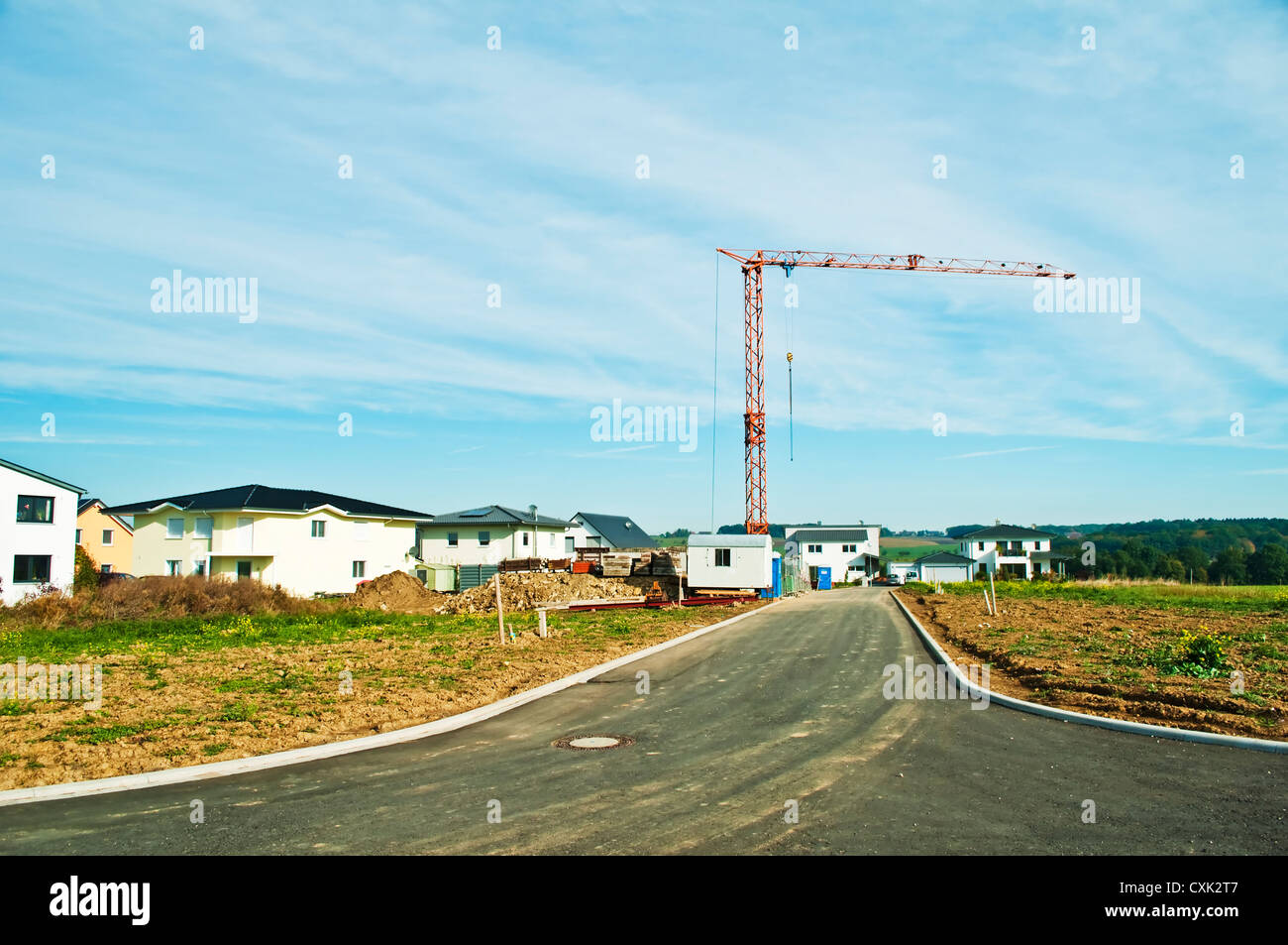 construction area with crane an d new houses Stock Photo - Alamy