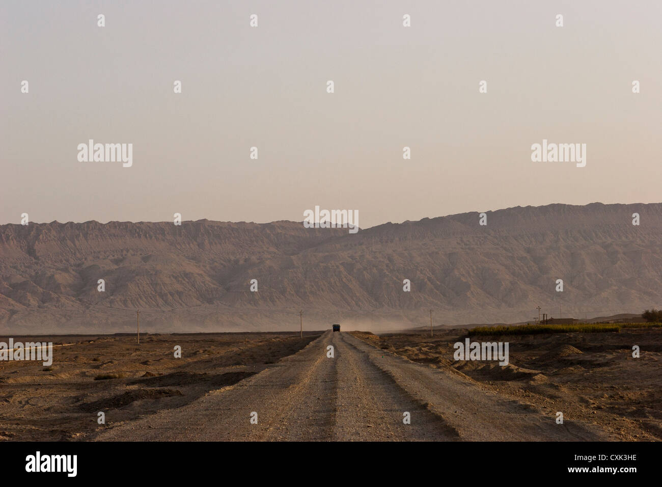 Sunrise over the desert on the road outside Turpan, Xinjiang, China ...