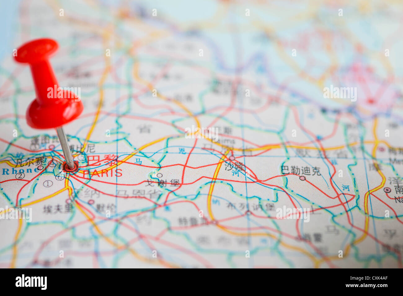 Thumbtack stuck in the map Stock Photo - Alamy