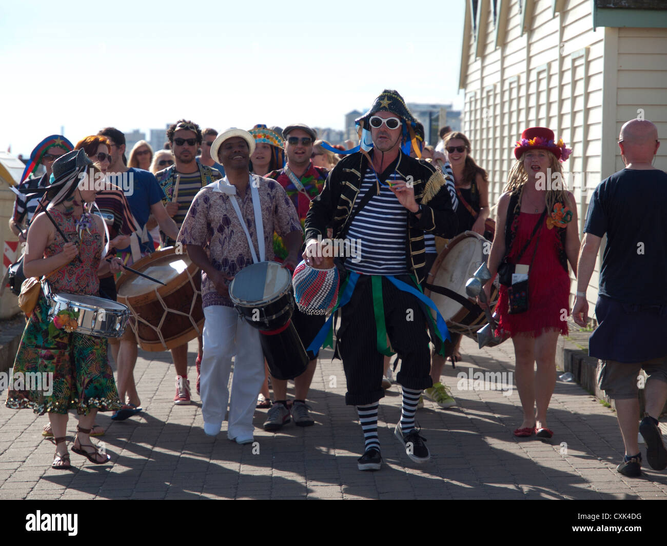 A samba band walks along the seafront at Brighton Stock Photo - Alamy