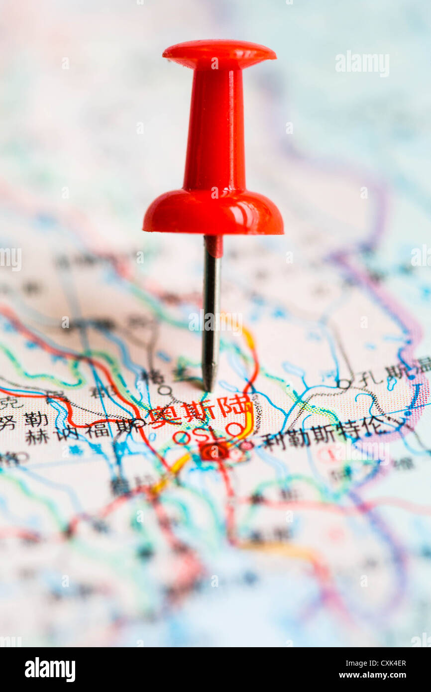 Thumbtack stuck in the map Stock Photo - Alamy