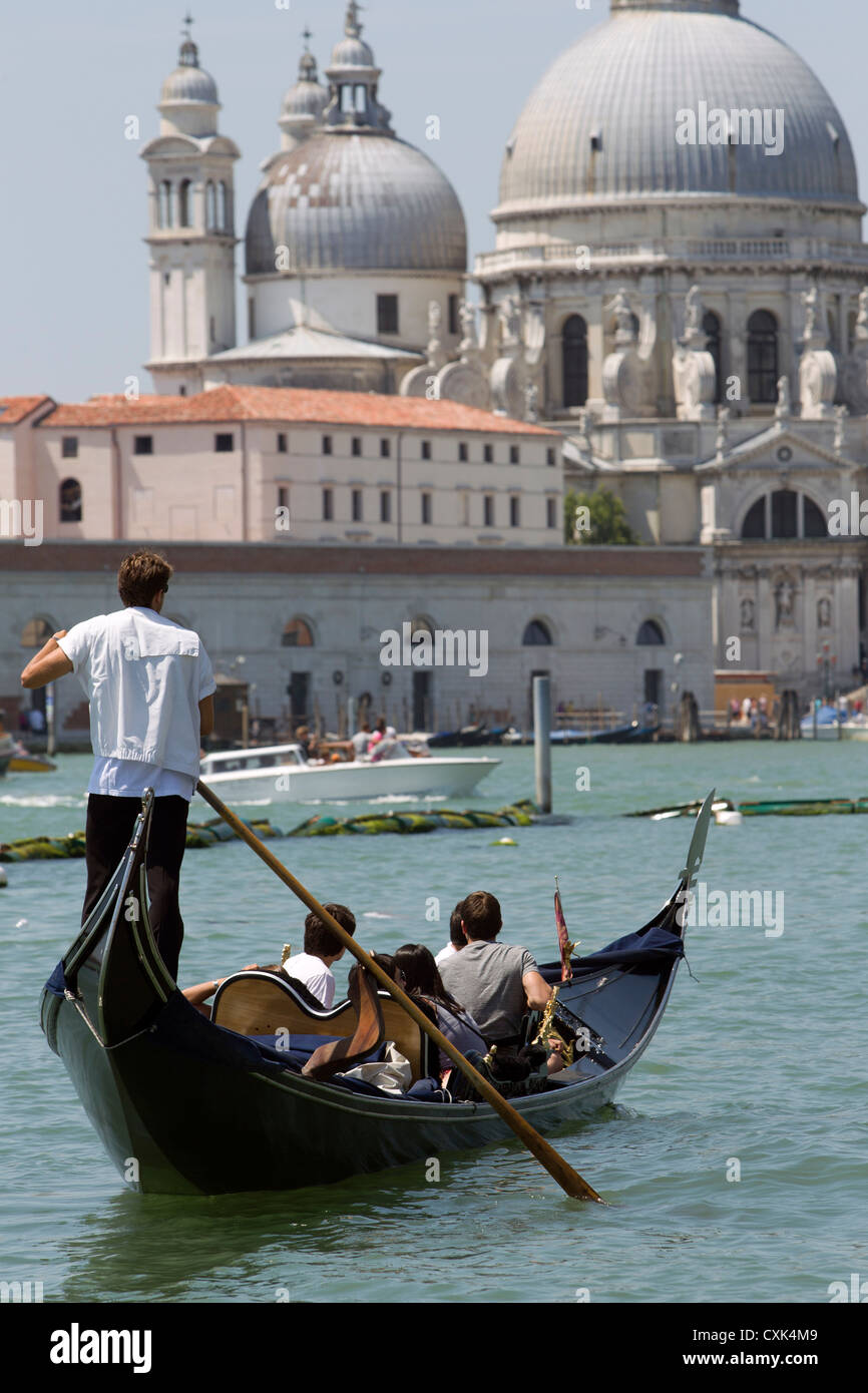 Gondola on Saint Mark's Canal with the Basilica of St Mary of Health in ...
