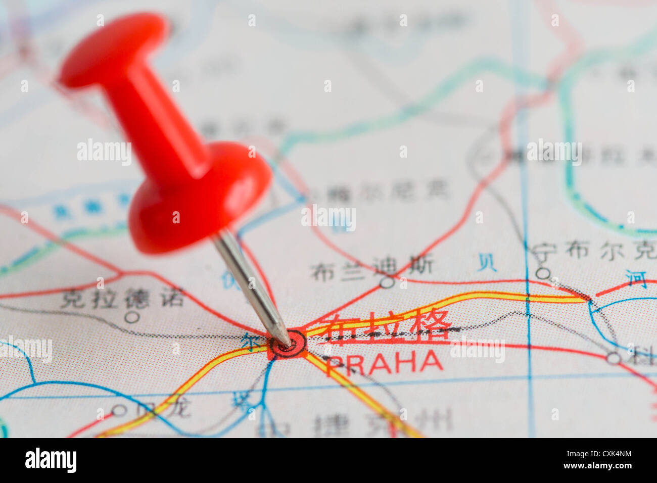Thumbtack stuck in the map Stock Photo - Alamy