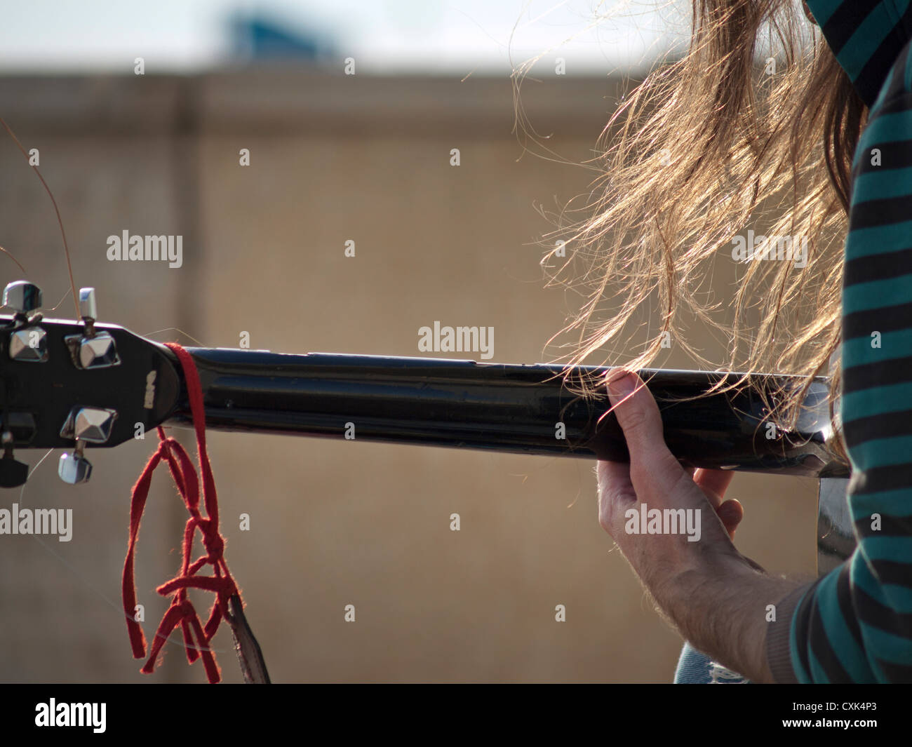 Long hair busker hi-res stock photography and images - Alamy