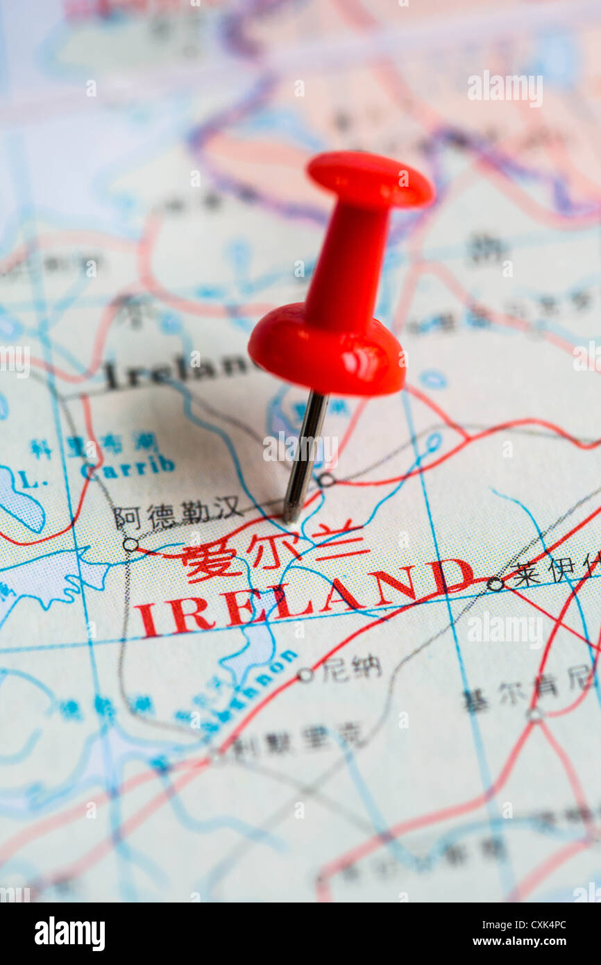 Thumbtack stuck in the map Stock Photo - Alamy