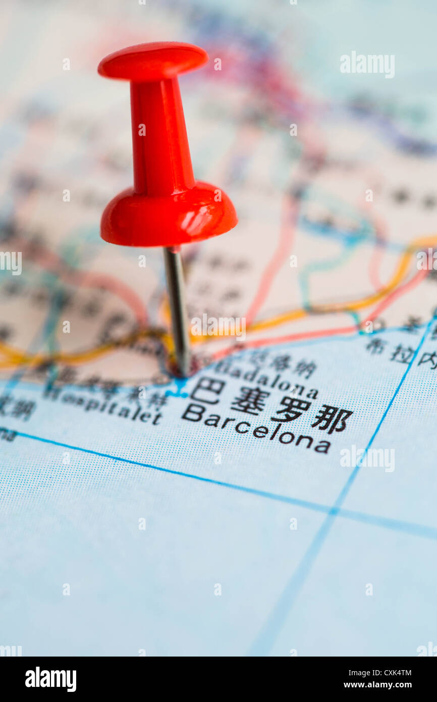 Thumbtack stuck in the map Stock Photo - Alamy