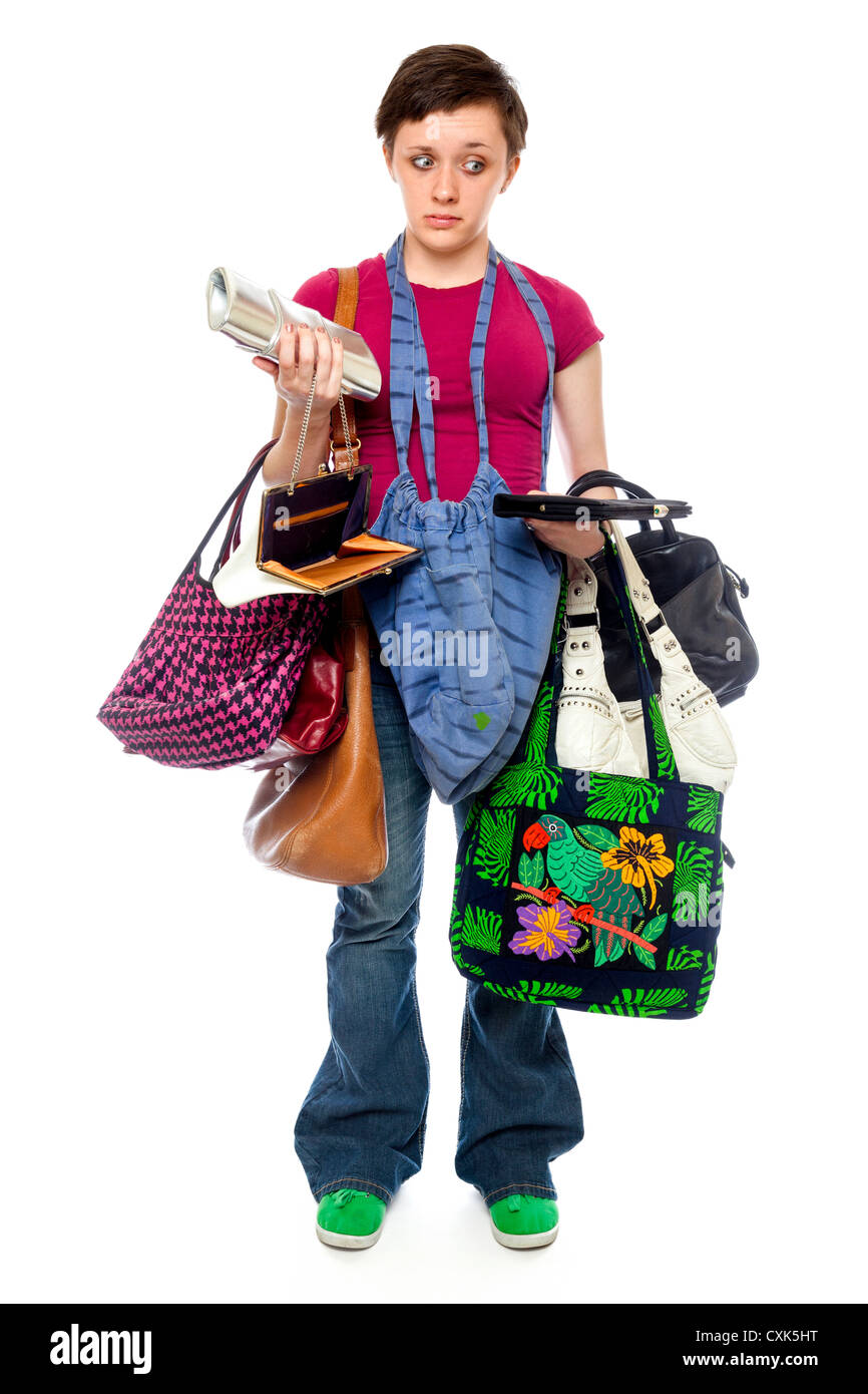 A female teenager poses with a bunch of purses and ladies and women's ...