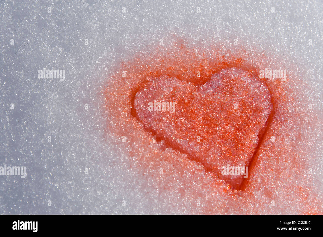 Red Heart in Snow Stock Photo - Alamy