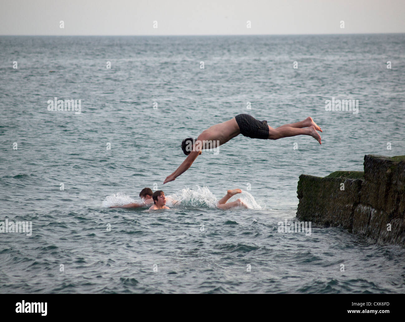 Diving into the sea at Brighton Stock Photo - Alamy