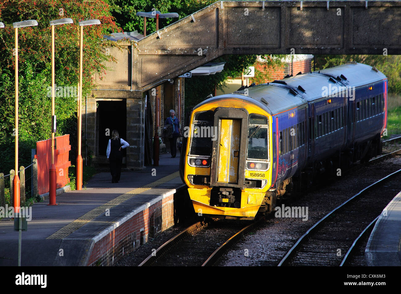 Passengers getting off the train at a country railway station UK Stock ...