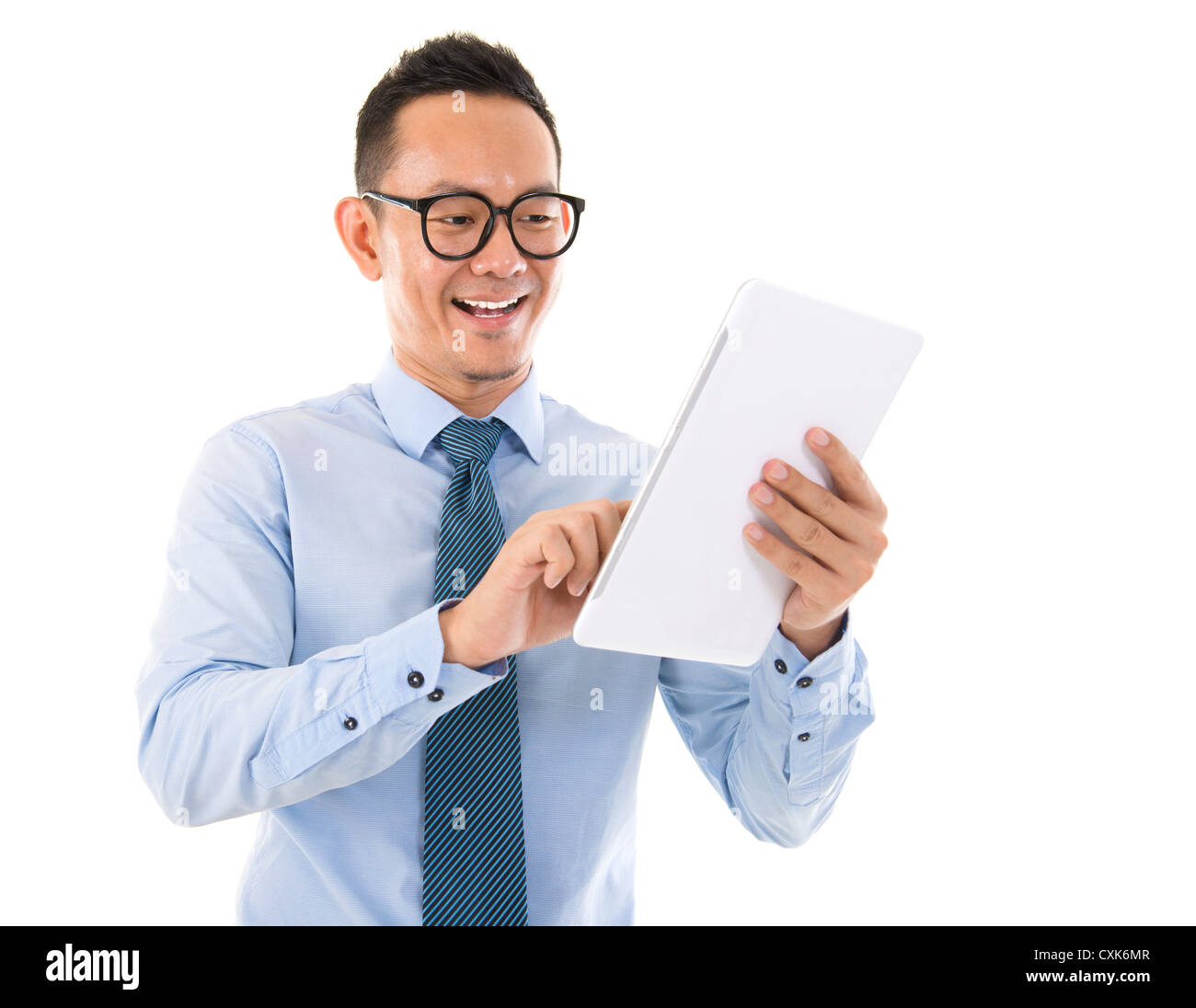 Handsome smiling Asian man with tablet computer. Isolated over white ...