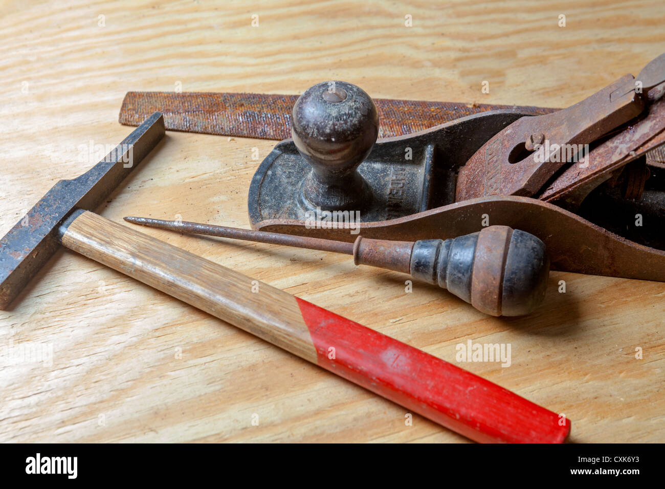A collection of carpenter tools on a wood table Stock Photo - Alamy