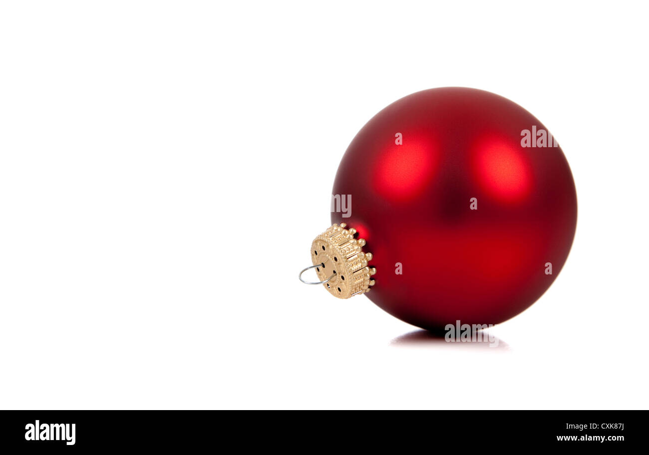 a single red Christmas ornament/bauble on a white background with copy ...