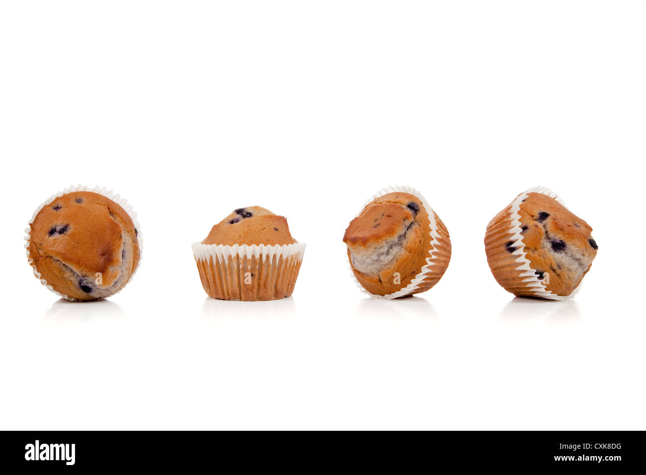 a row of blueberry muffins on a white background with copy space Stock ...