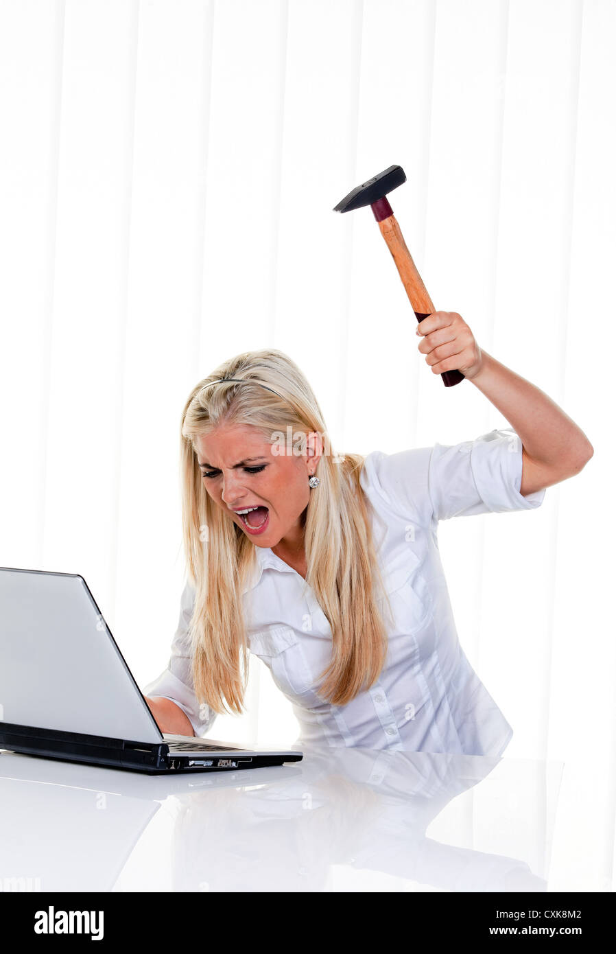 Hammer and laptop hi-res stock photography and images - Alamy