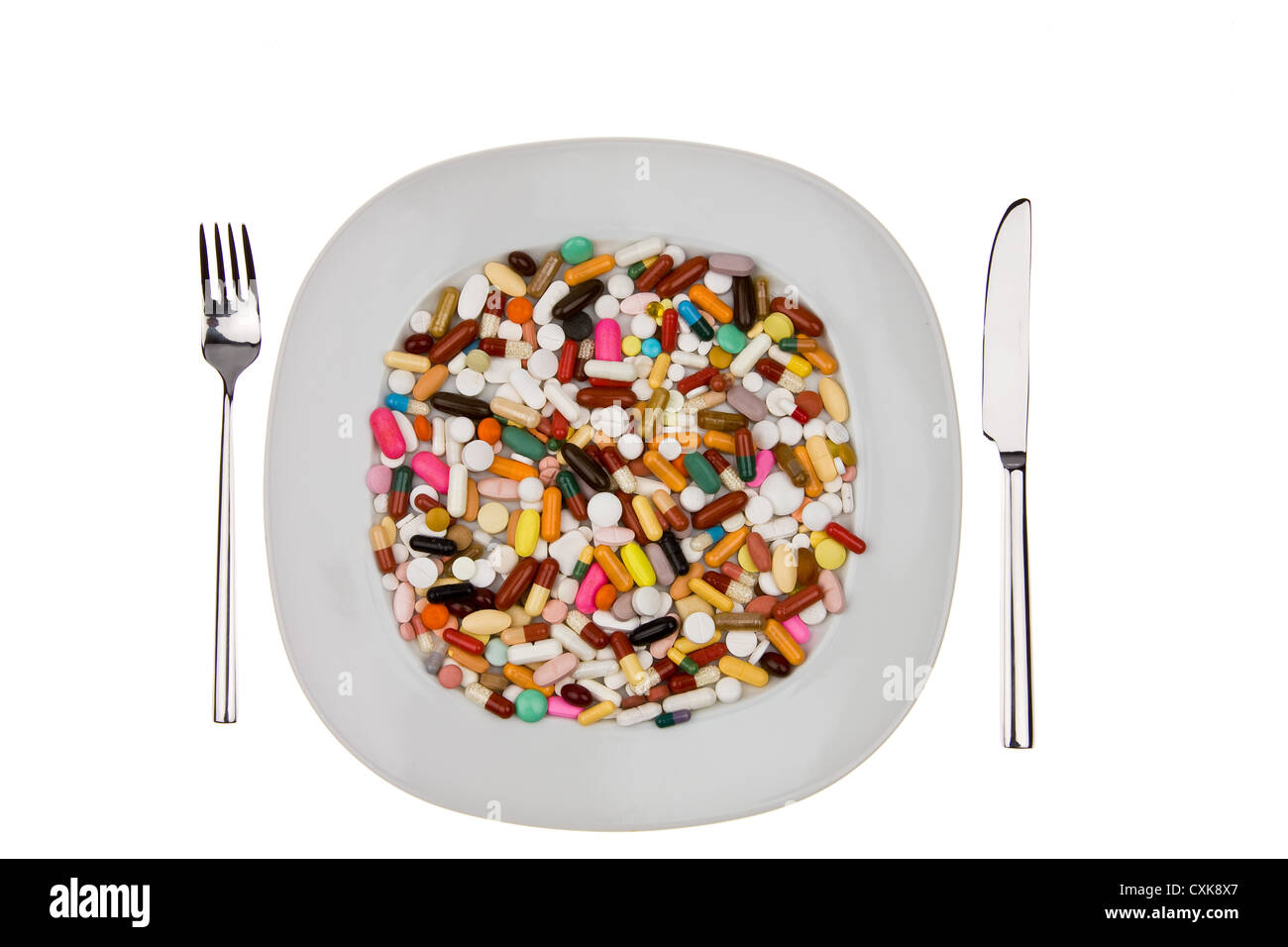 Many tablets on a plate Stock Photo - Alamy