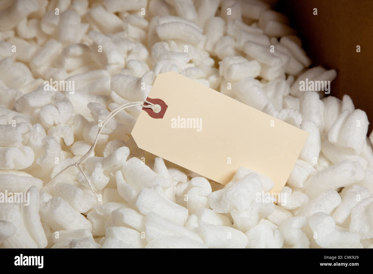 Packing Styrofoam background with a mailing label in the middle Stock ...