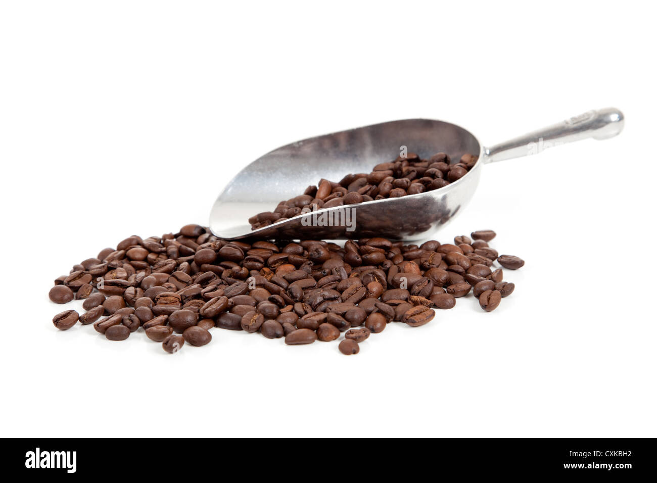 Silver scoop with coffee beans on a white background Stock Photo - Alamy