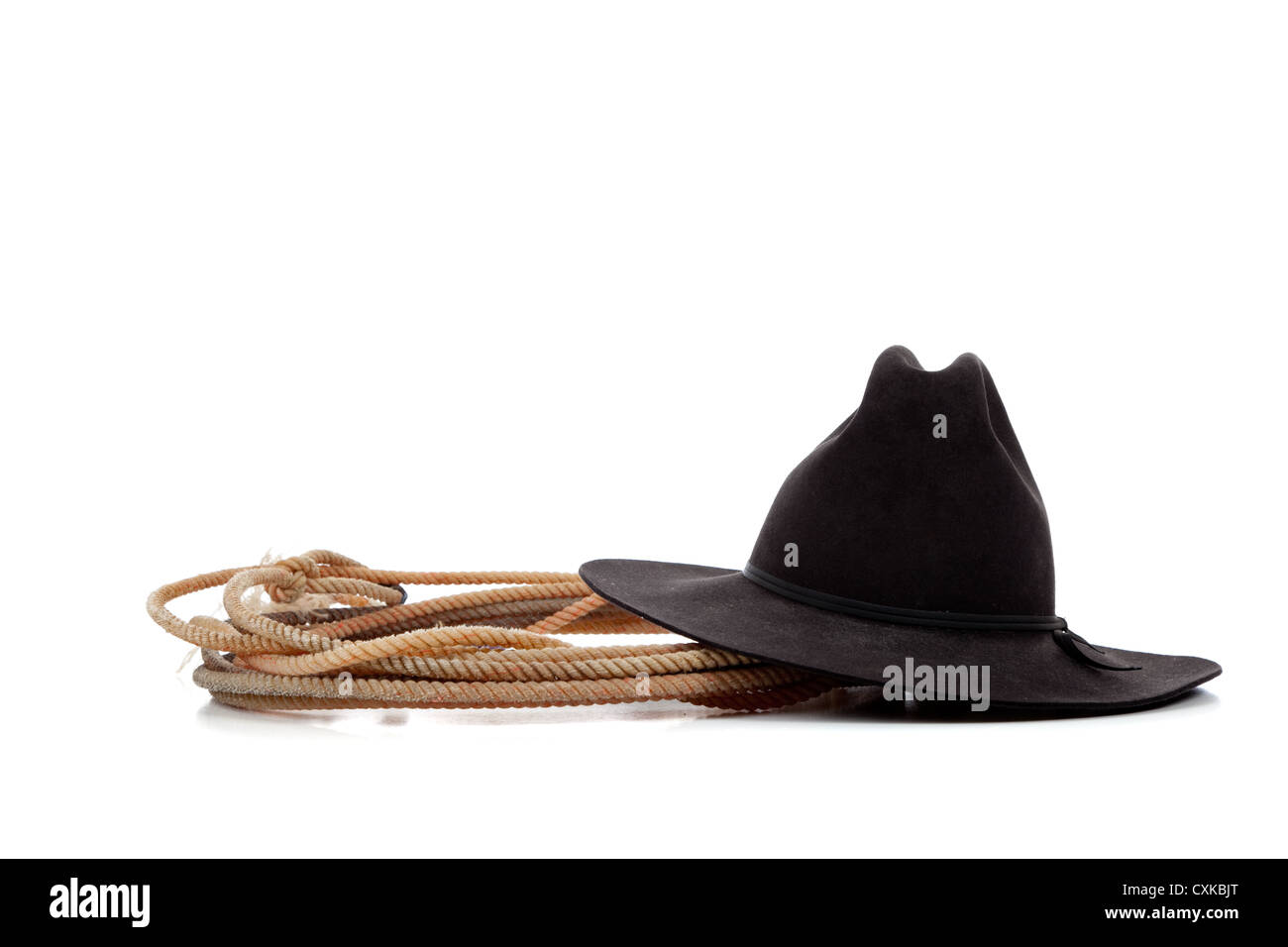 A black cowboy hat and lariat on a white background Stock Photo - Alamy