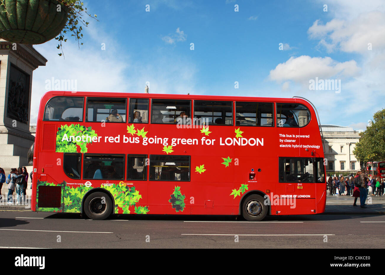 A red double decker bus traveling in London Stock Photo - Alamy