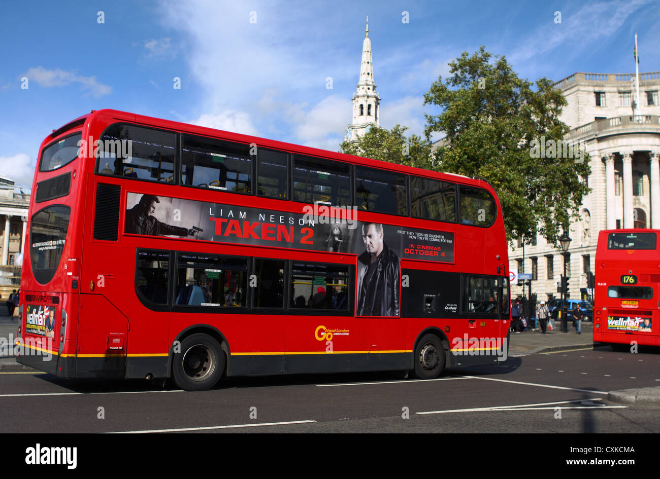 Red London double decker buses traveling in London Stock Photo - Alamy