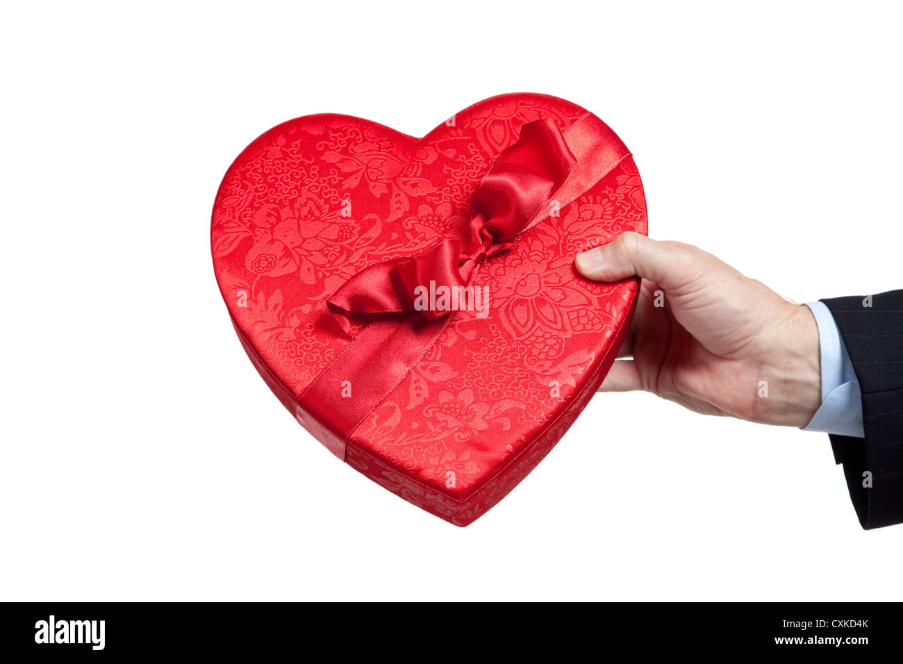 Hand holding out heart candy hi-res stock photography and images - Alamy