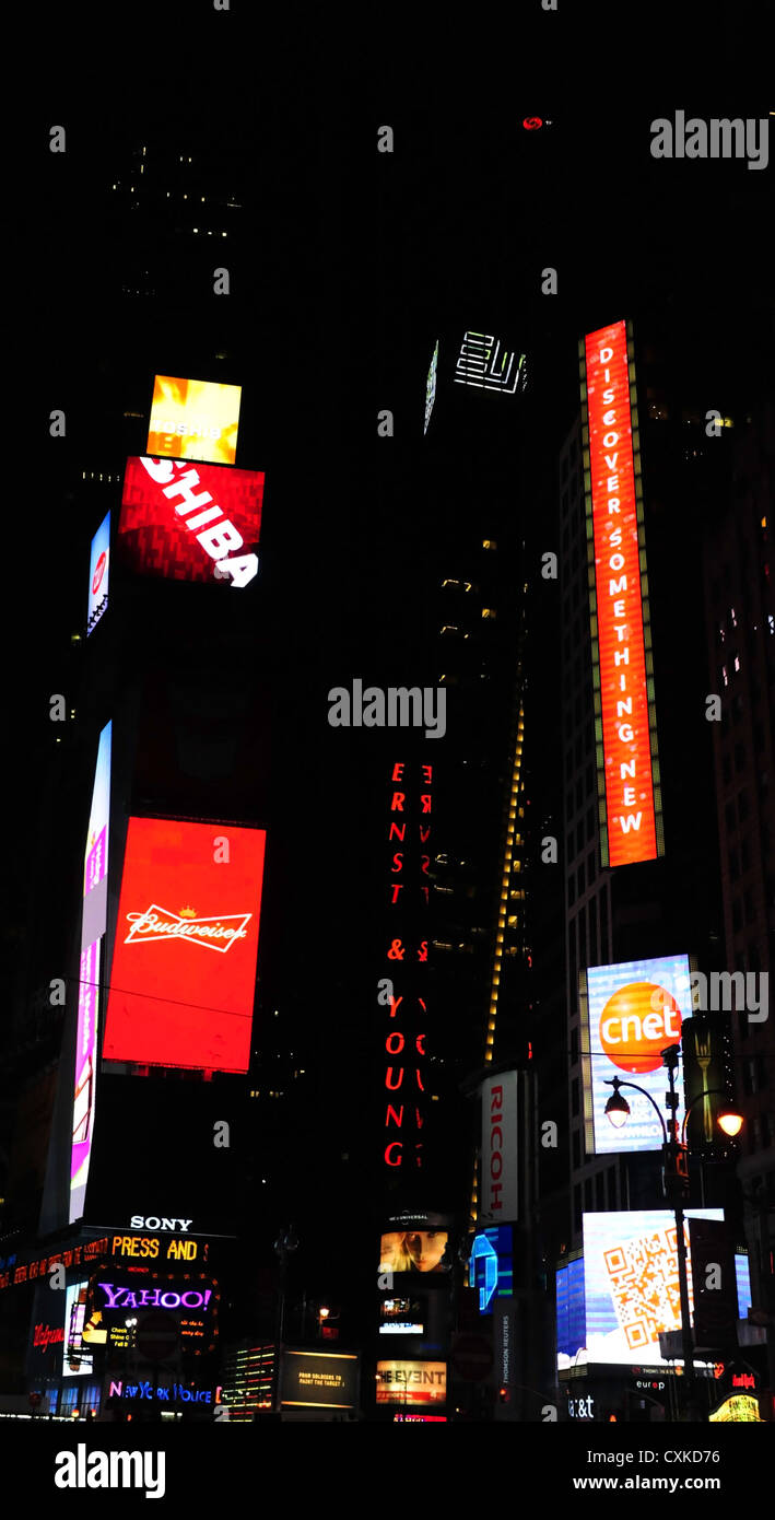 Neon several large colourful led billboards advertsiements rising ...