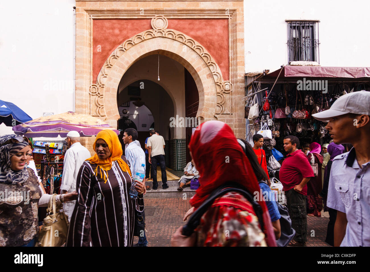 Women and mosque at a souk in Rabat, Morocco Stock Photo - Alamy