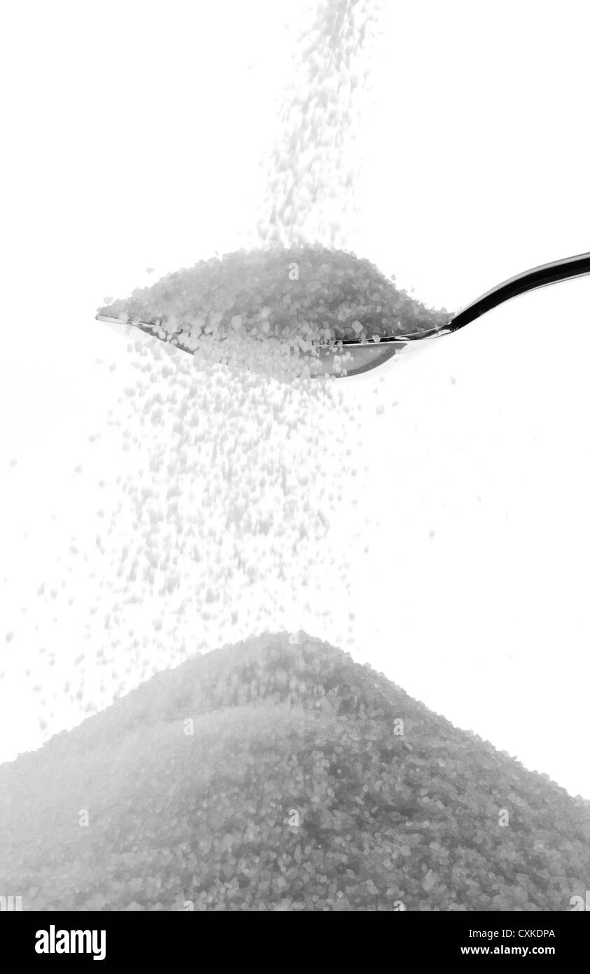 Granulated sugar on a spoon Stock Photo - Alamy