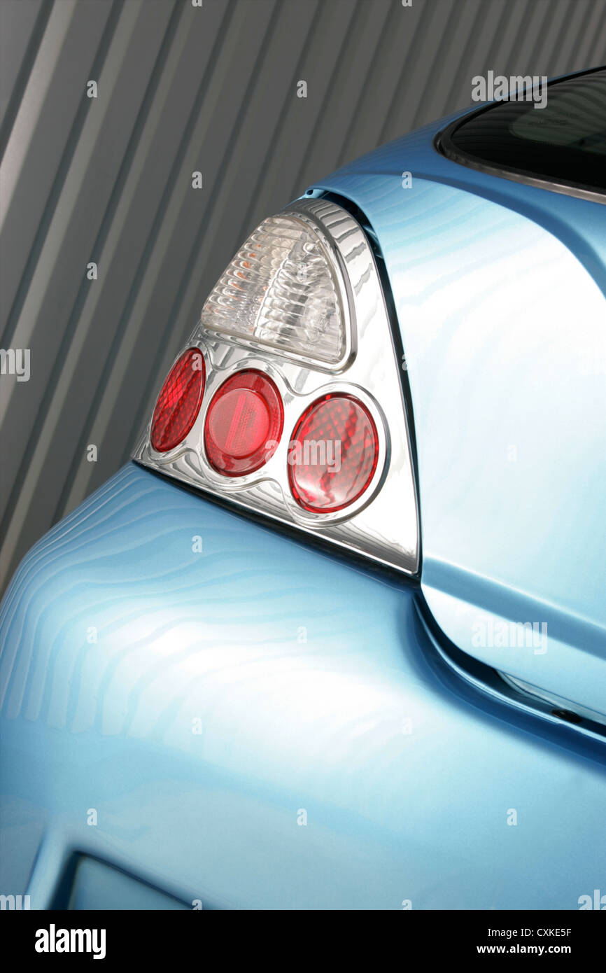 Generic rear close up perspective of blue car Stock Photo - Alamy