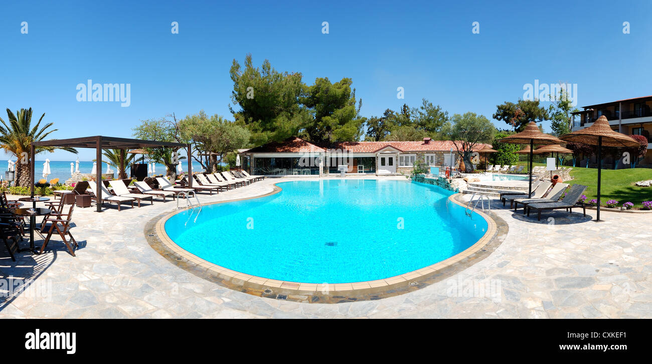 Panorama of swimming pool by beach at the modern luxury hotel ...