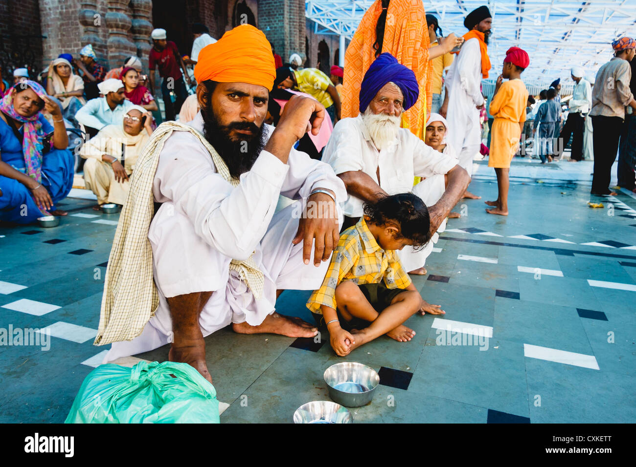 Pilgrims at the langar dining hall of the Golden Temple, Amritsar ...