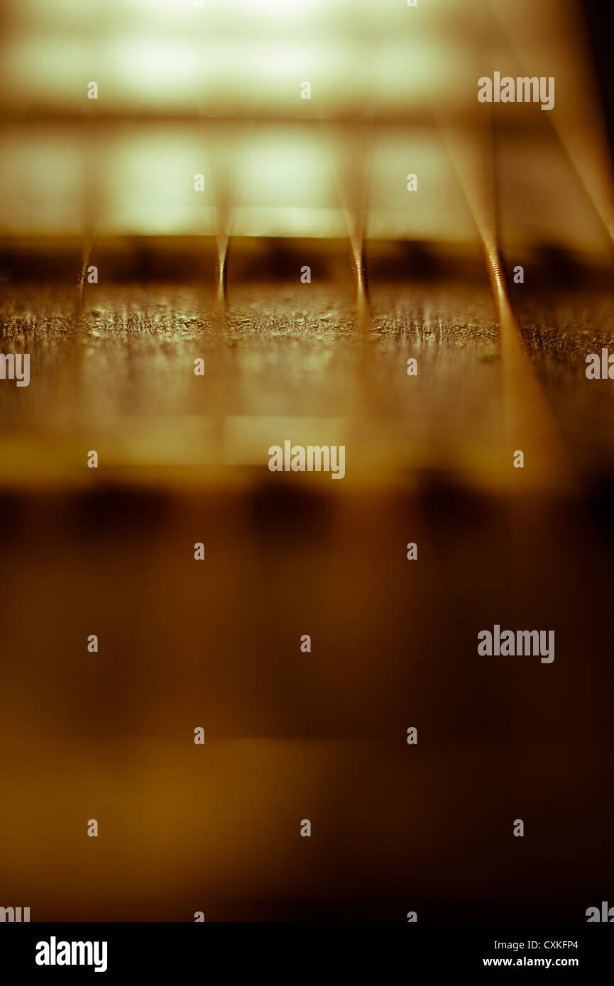 A close up view of an acoustic guitar neck Stock Photo - Alamy