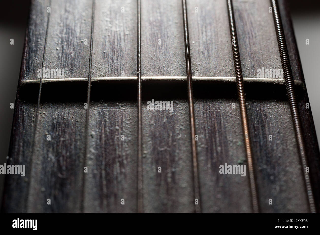 A close up view of an acoustic guitar neck Stock Photo - Alamy