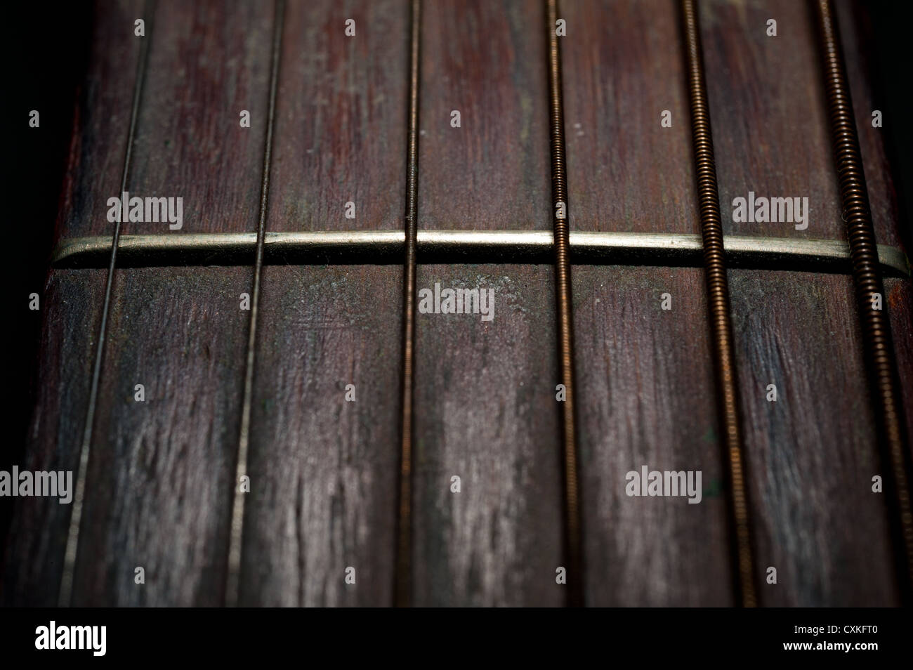 A close up view of an acoustic guitar neck Stock Photo - Alamy