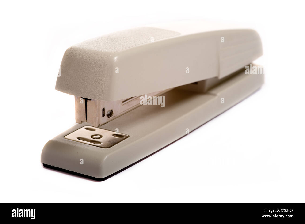 A brown office stapler on a white background with copy space Stock ...
