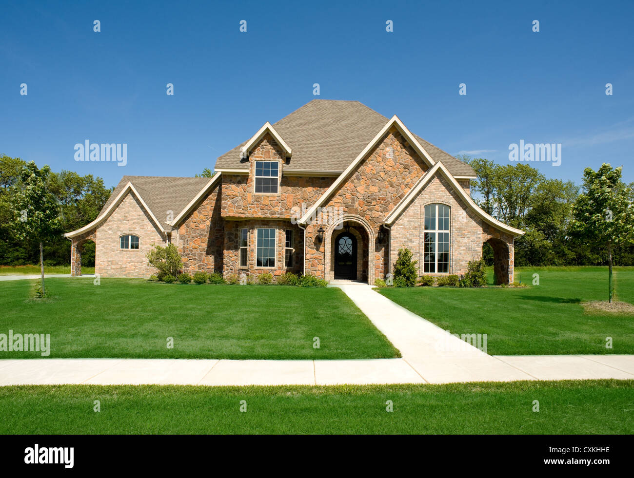 A beautiful home or house on a sunny day, construction industry, real ...