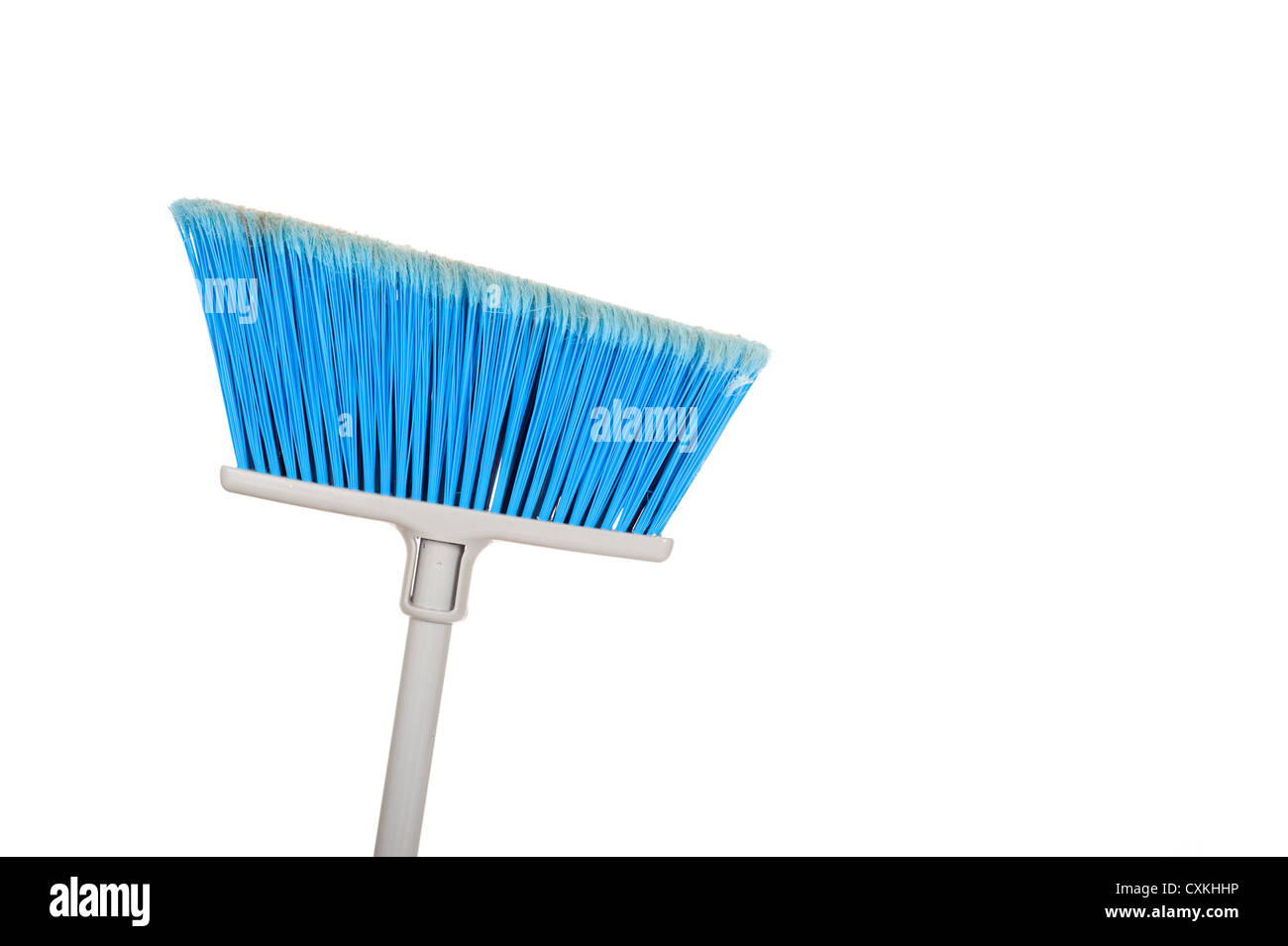 A blue sweeping broom on a white background Stock Photo - Alamy
