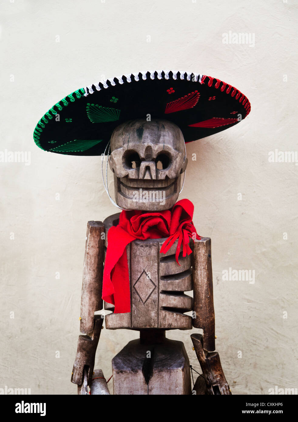 Mexican Wooden Skeleton in a White Wall Stock Photo - Alamy