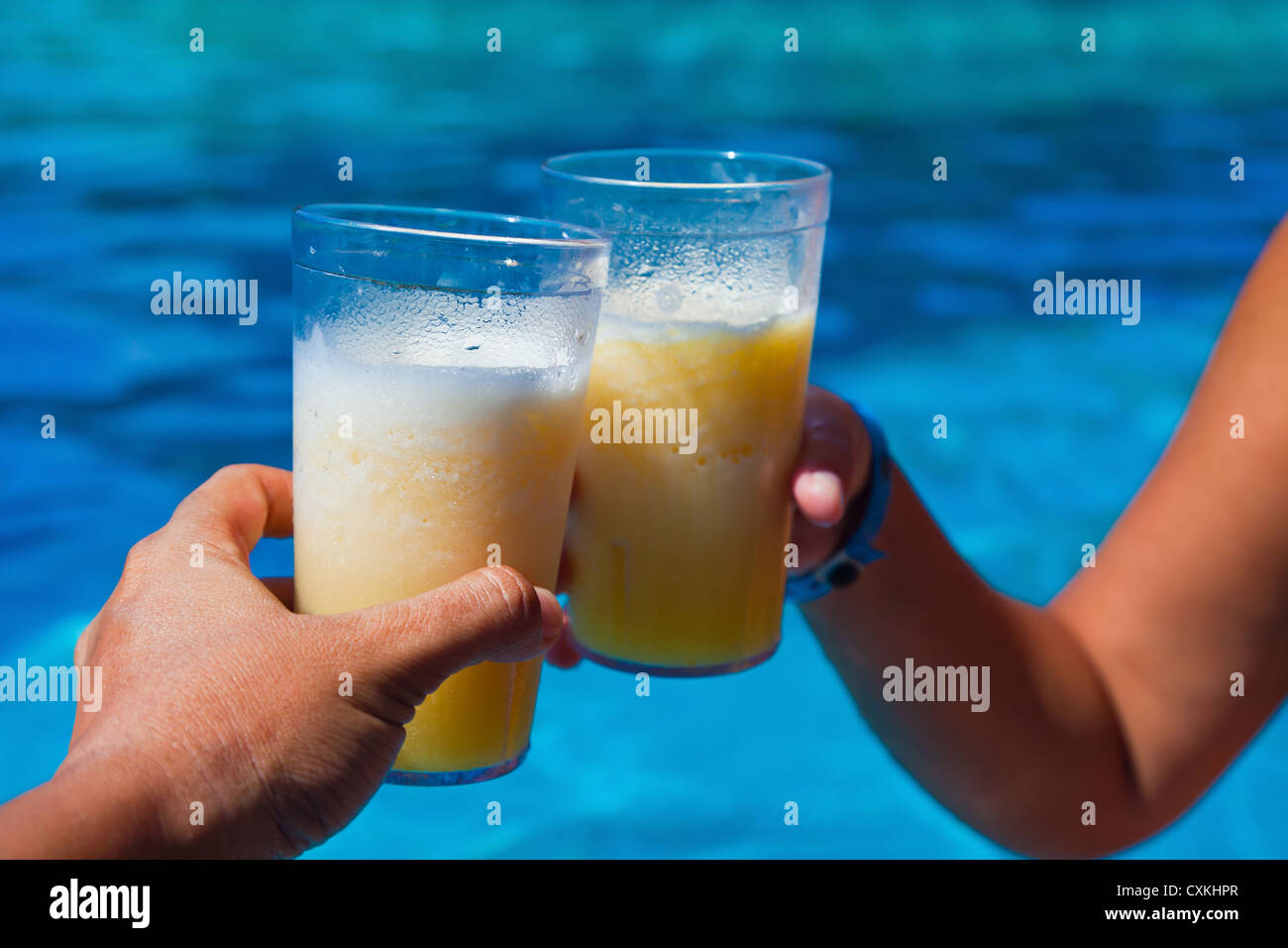 Toasting in the Pool Stock Photo - Alamy