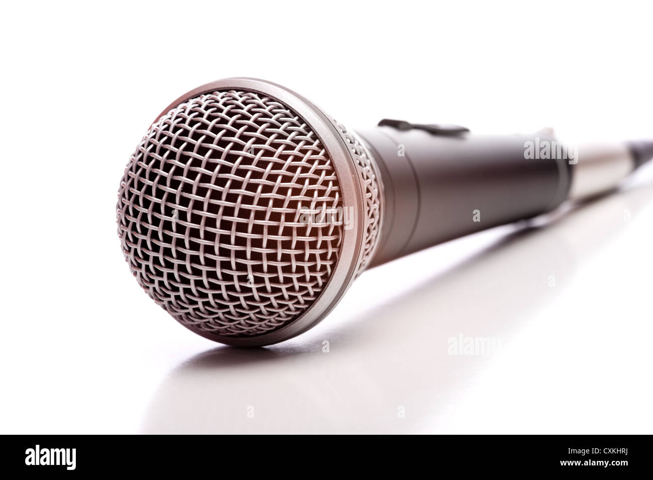 Silver microphone on a white background Stock Photo - Alamy