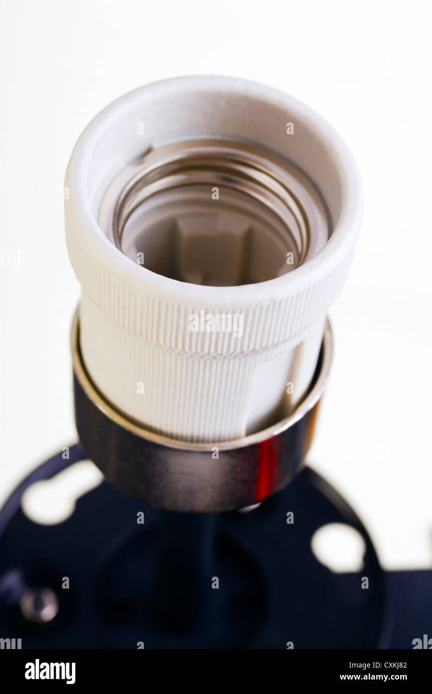 Close up of a ceramic lamp socket isolated on white background Stock ...