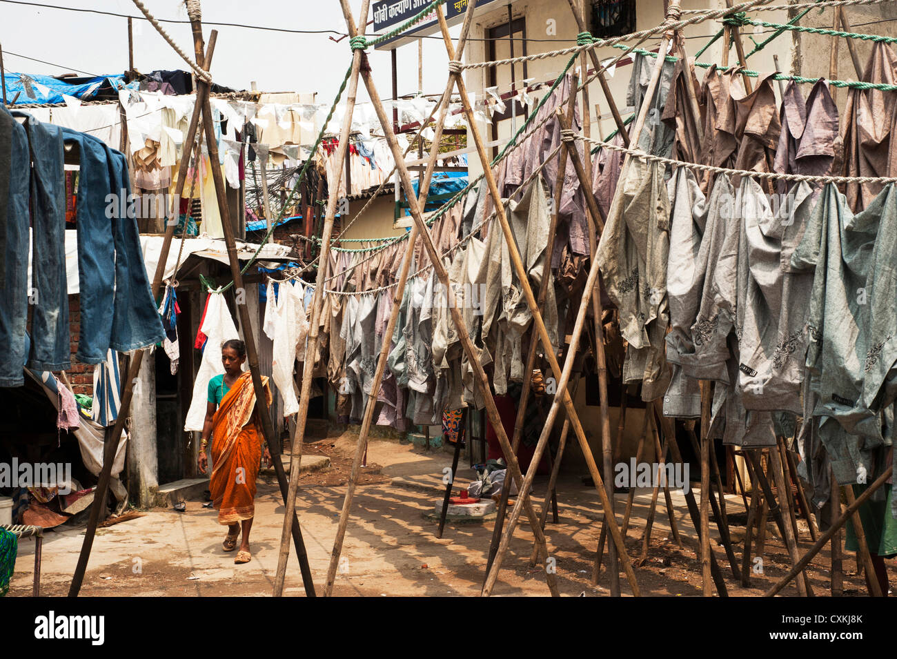 Woman drying cloths hi-res stock photography and images - Alamy