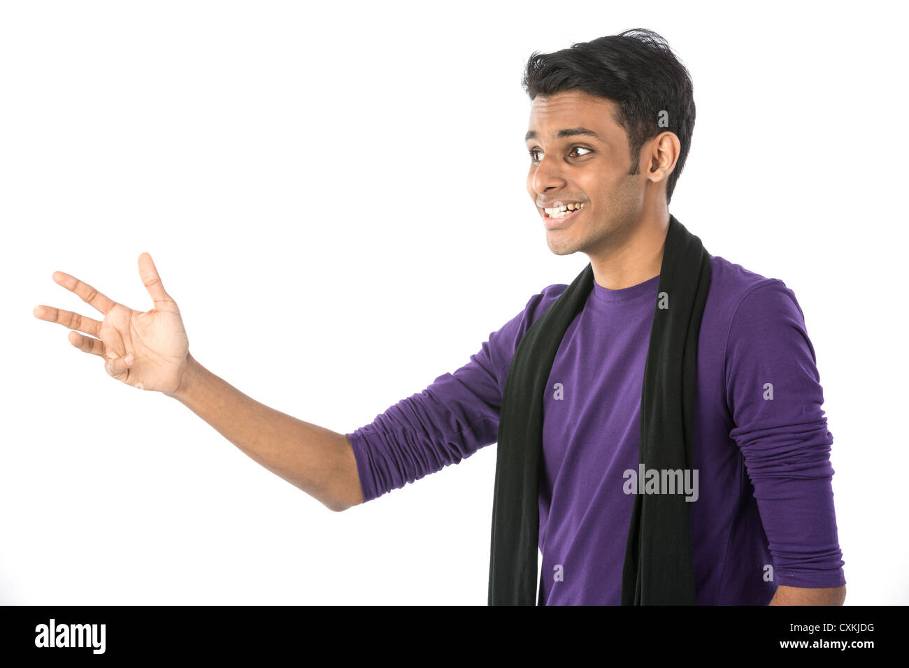 Side view of a young man talking and looking left. Isolated against ...