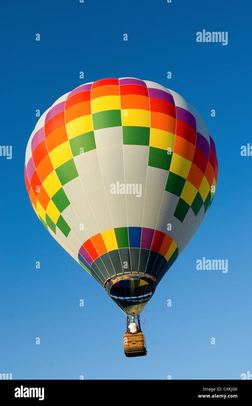 A hot air balloon in front of a blue sky with copy space Stock Photo ...