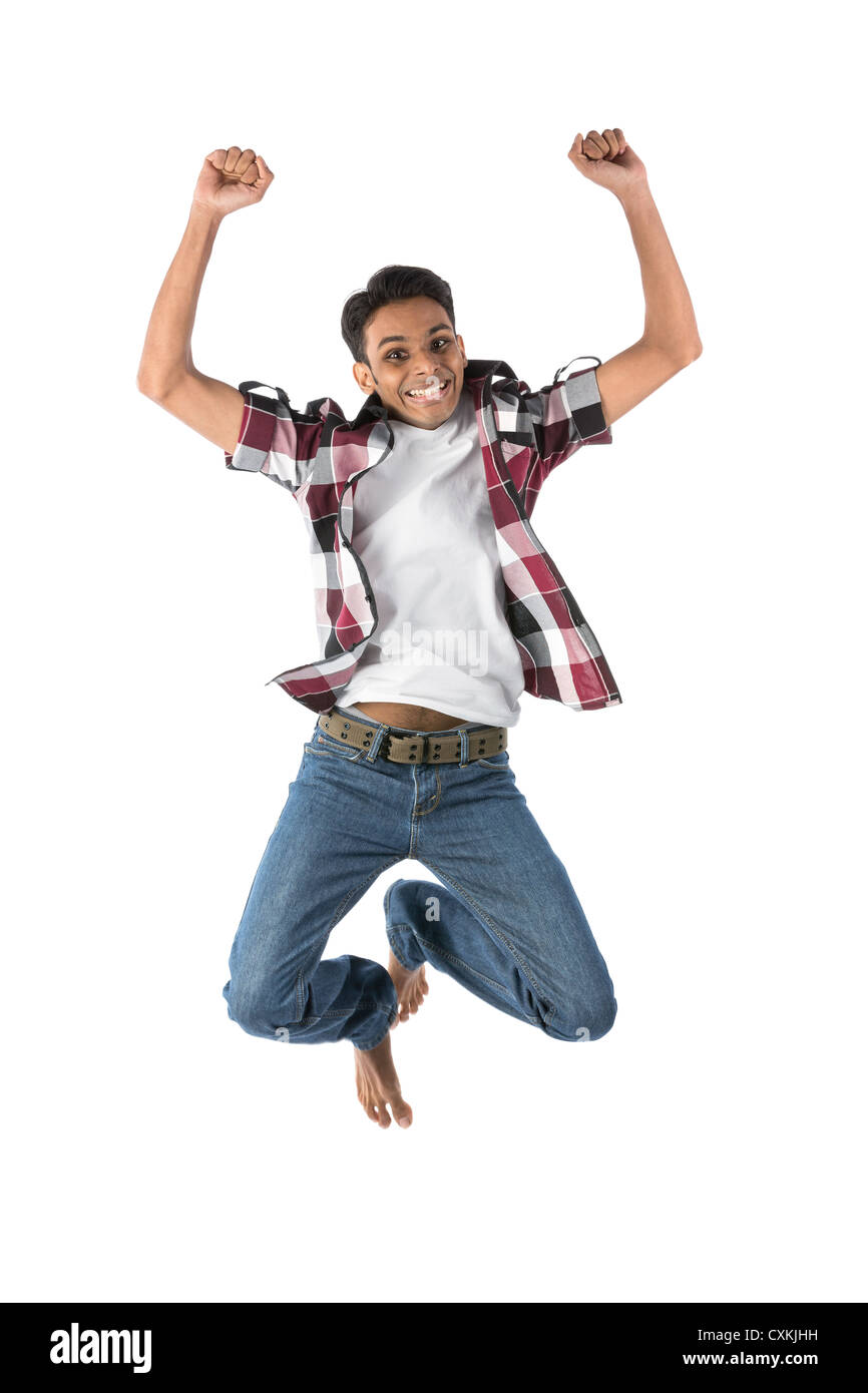Happy Indian man jumping in the air. Isolated on white Stock Photo - Alamy