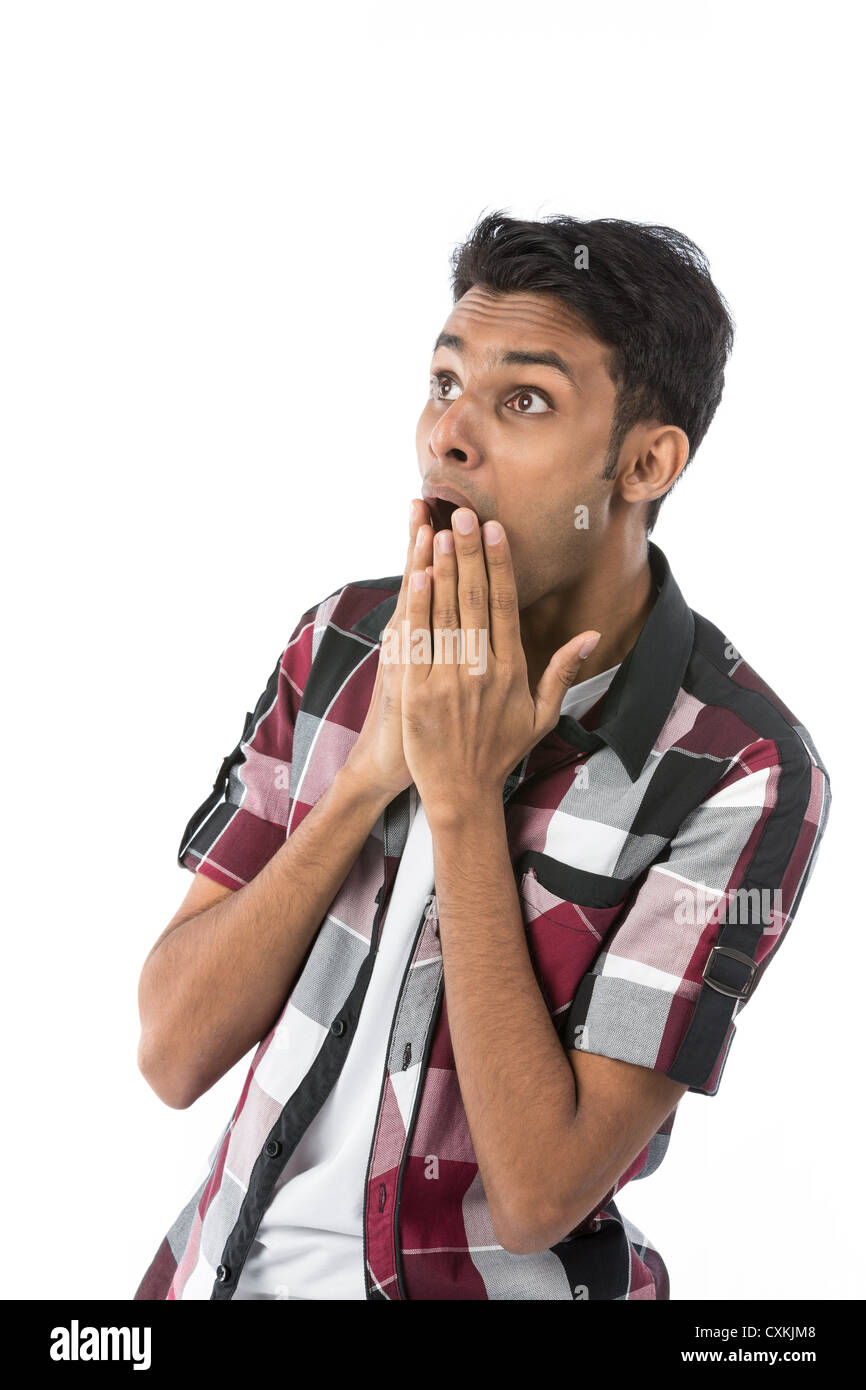 Shocked young Indian man. Isolated on white background Stock Photo - Alamy