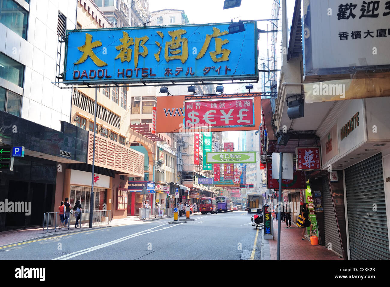 Street view with traffic and shops Stock Photo - Alamy